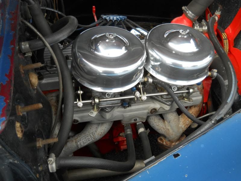 Who has a dual intake on a Flathead 6 cylinder? Can I see some pictures ...
